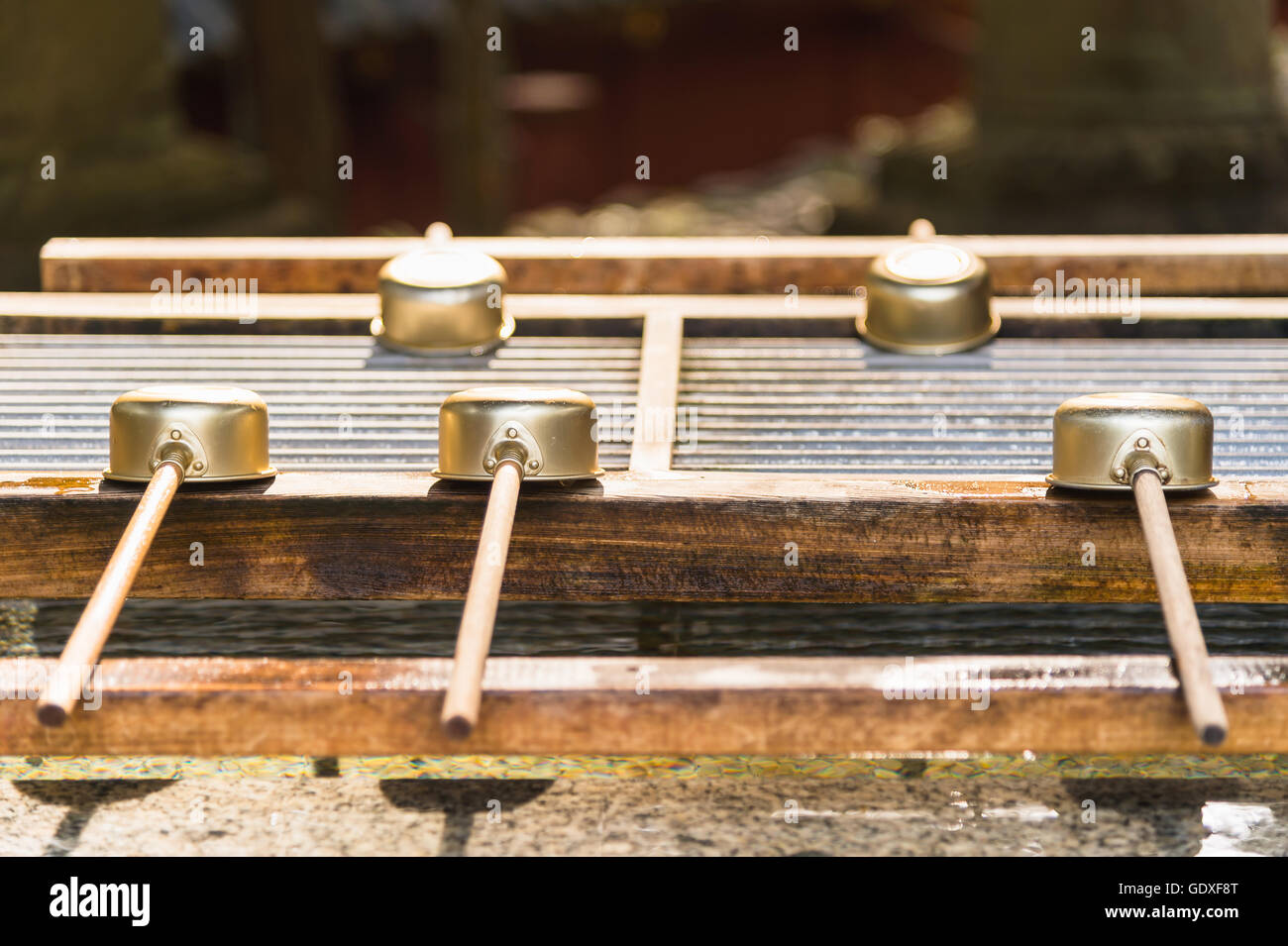 Japanese dippers for holy water Stock Photo - Alamy