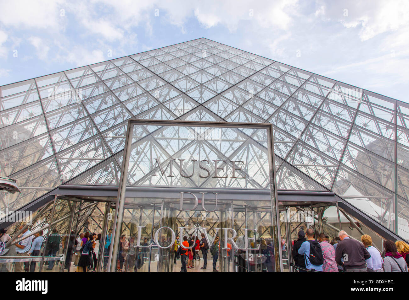 The glass pyramid entrance to the Louvre Museum in Paris, France, 2014 ...