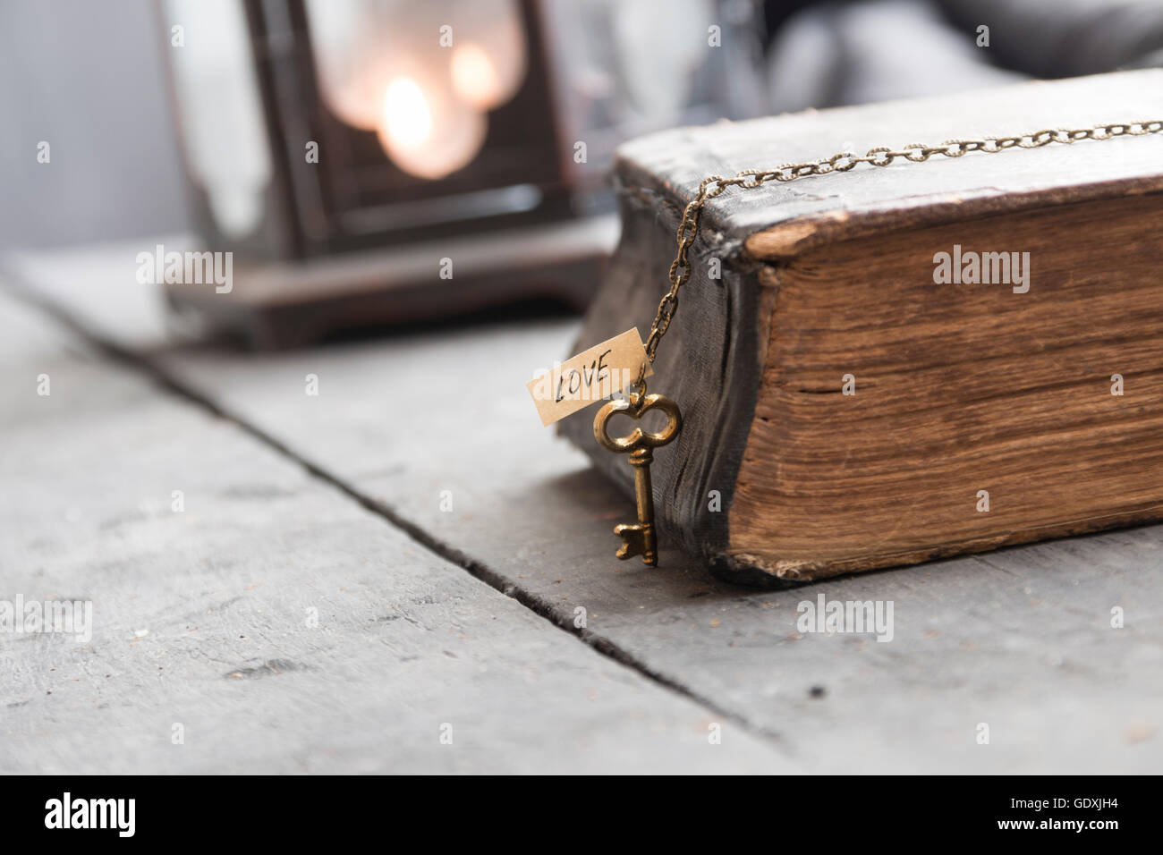 religion idea, Bible and key with word love Stock Photo - Alamy