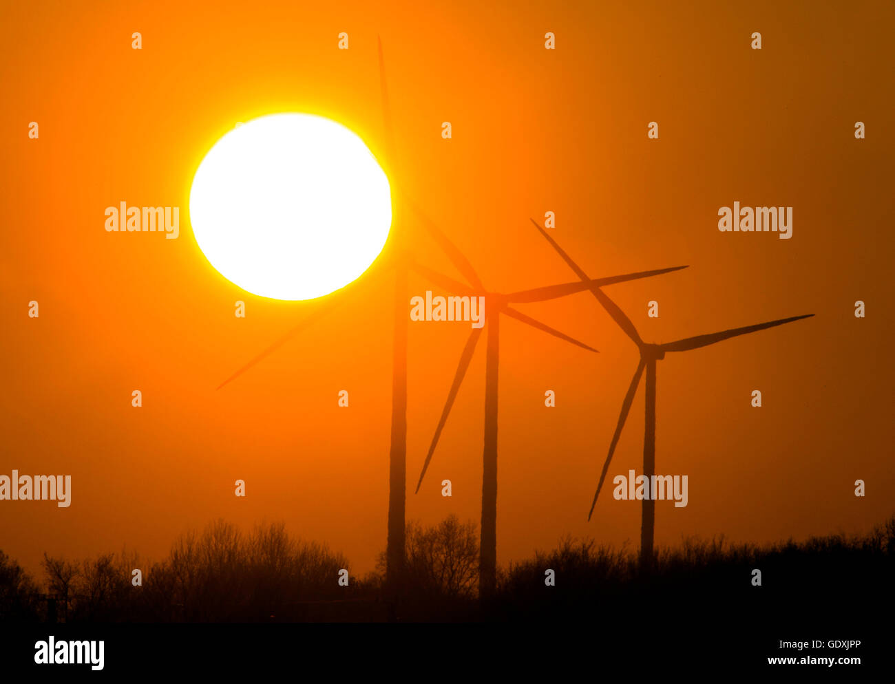 Sunset at a wind farm Stock Photo - Alamy
