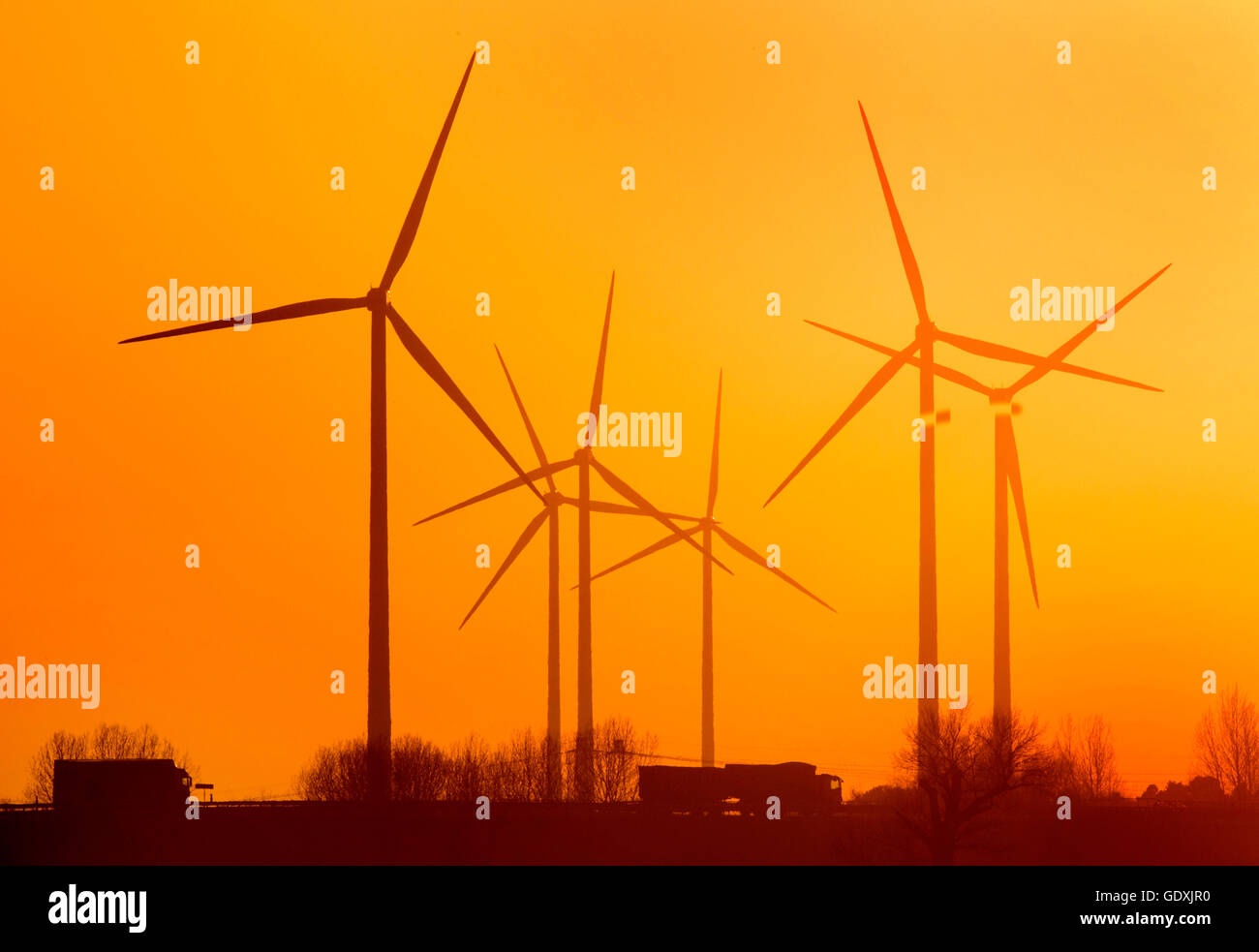 Sunset at a wind farm Stock Photo - Alamy