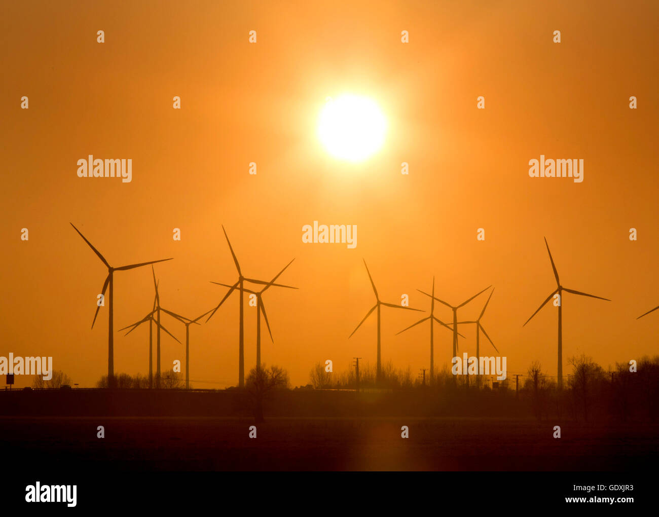 Sunset at a wind farm Stock Photo - Alamy