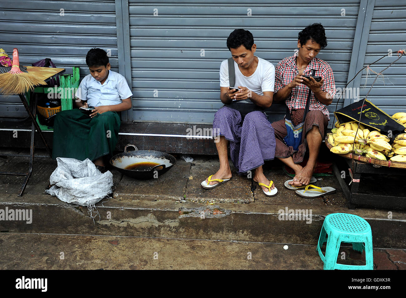 Three guys on the phone Stock Photo - Alamy