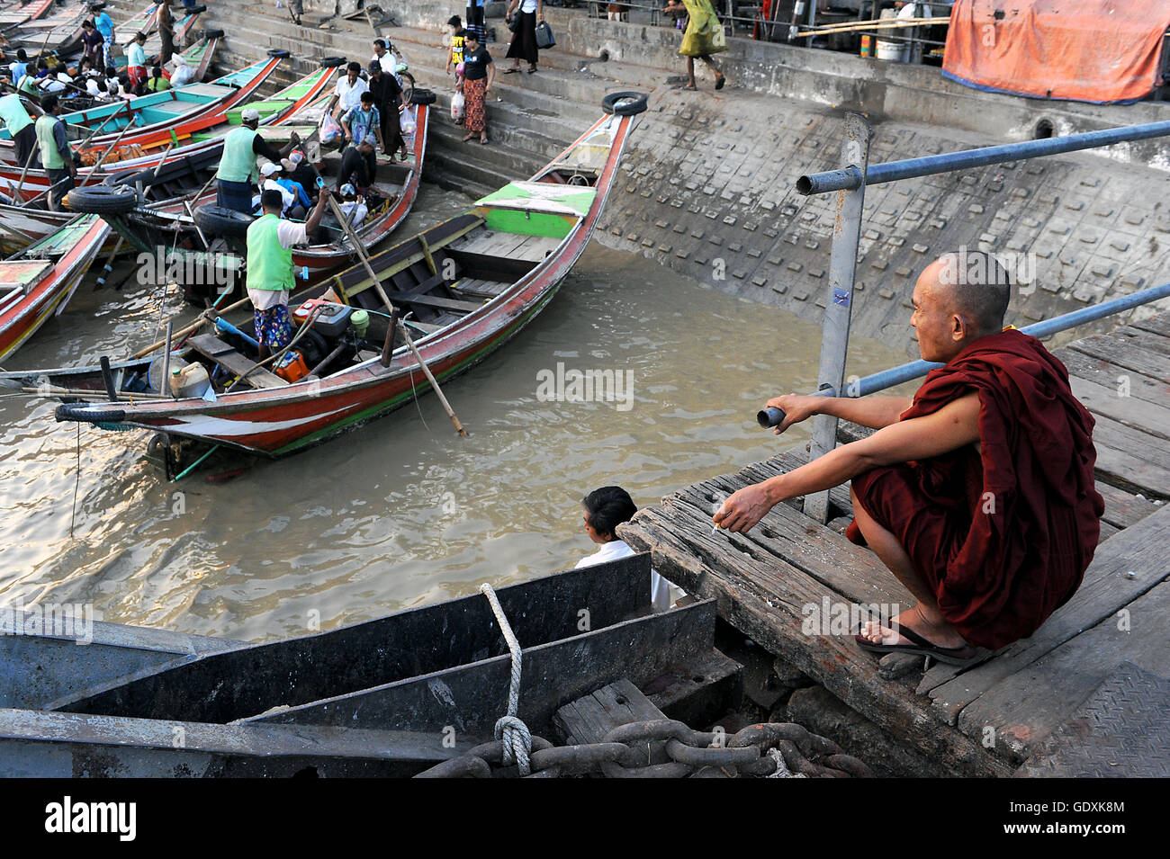 Monk at the Yangon River Stock Photo - Alamy