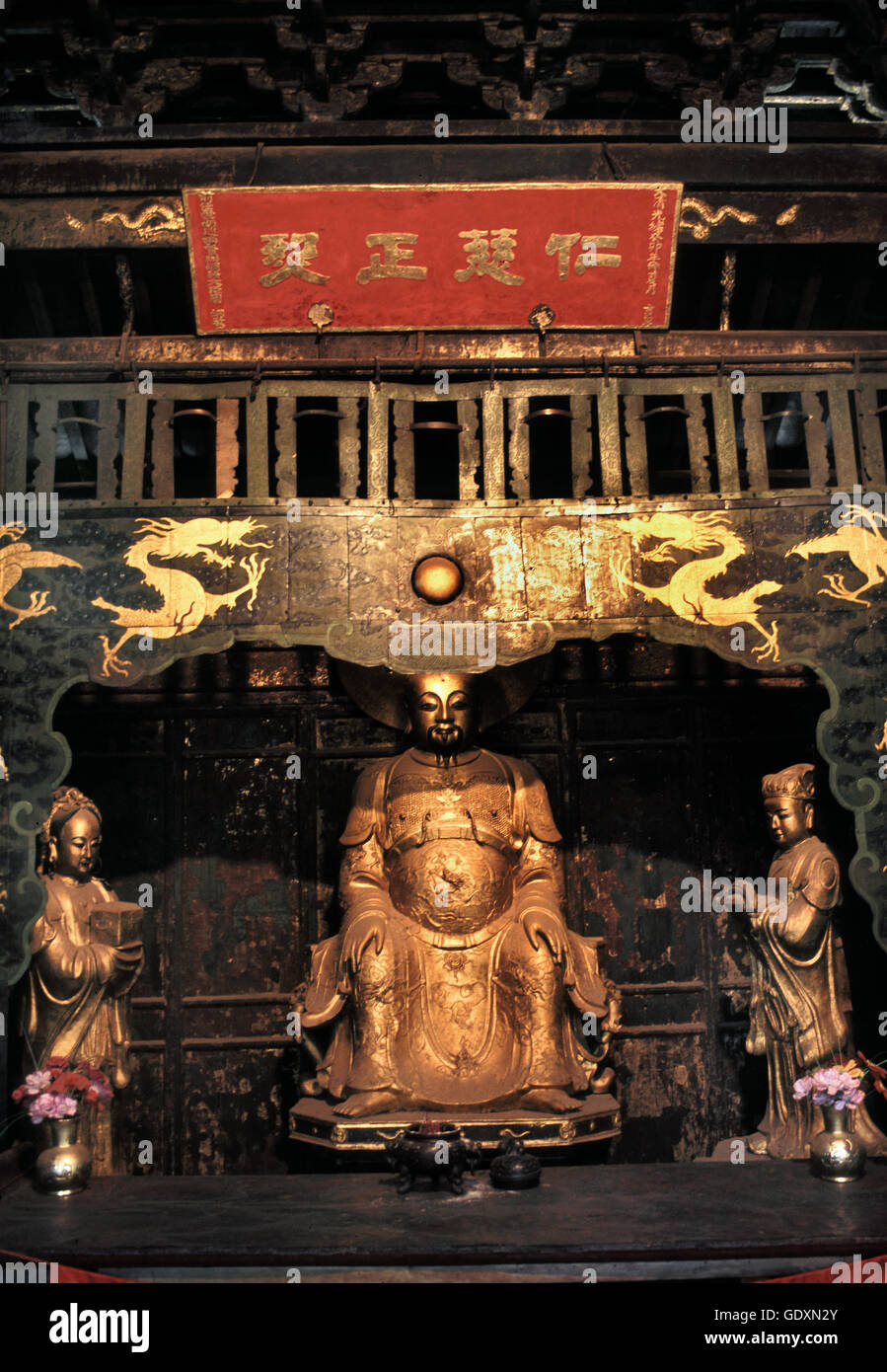 Gold statue in the Golden Temple. Located on top of Mingfeng (Singing ...