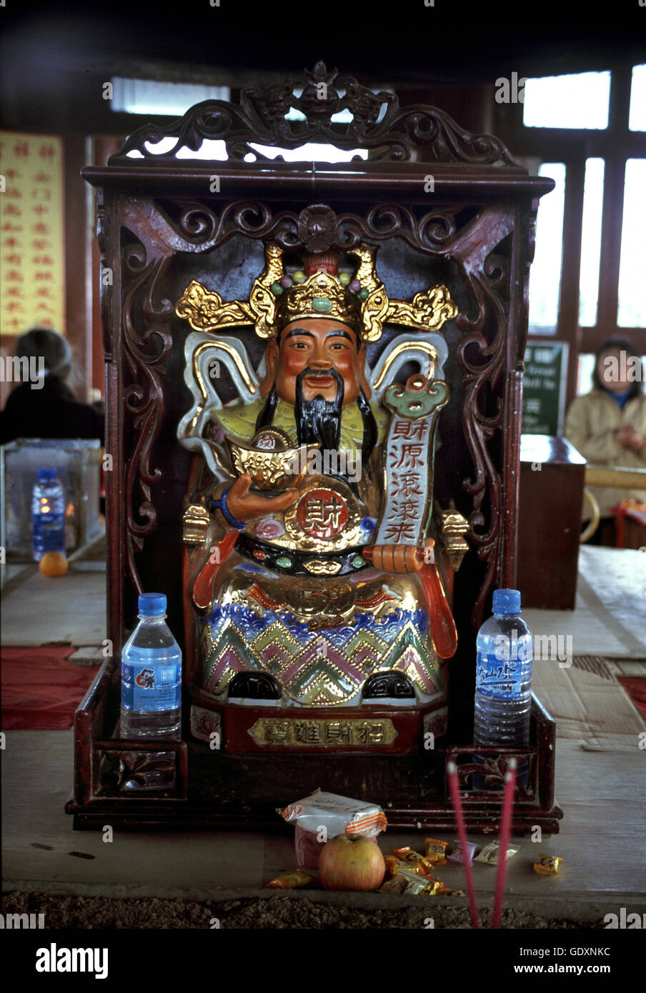 Statue of the Money God in the Bell Tower of the Golden Temple. Located ...