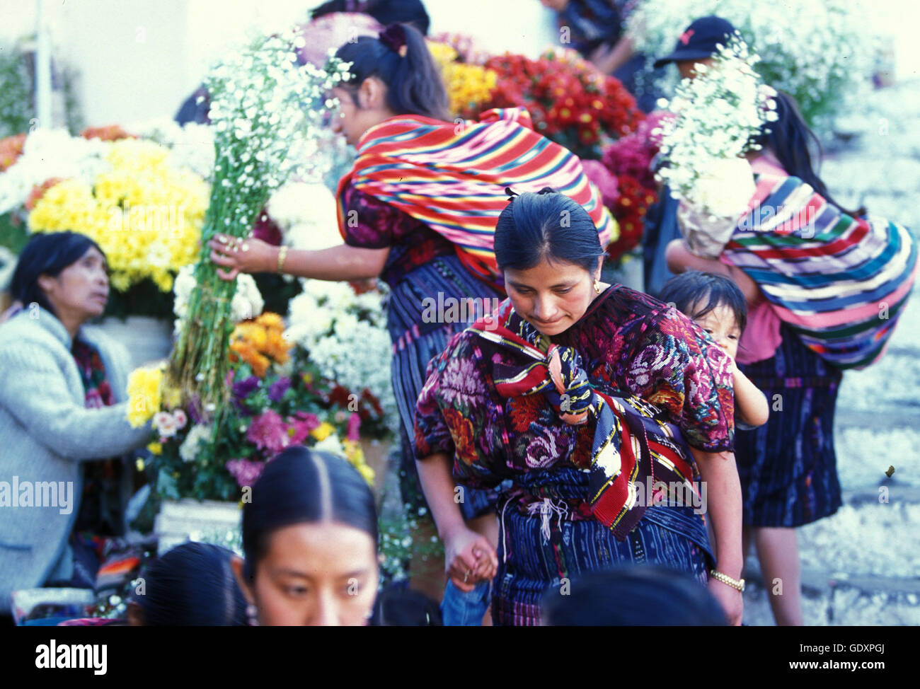 people in traditional clotes at the Market in the Village of Chichi or ...
