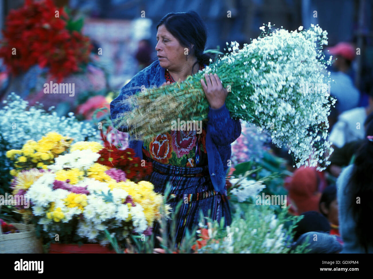 people in traditional clotes at the Market in the Village of Chichi or ...