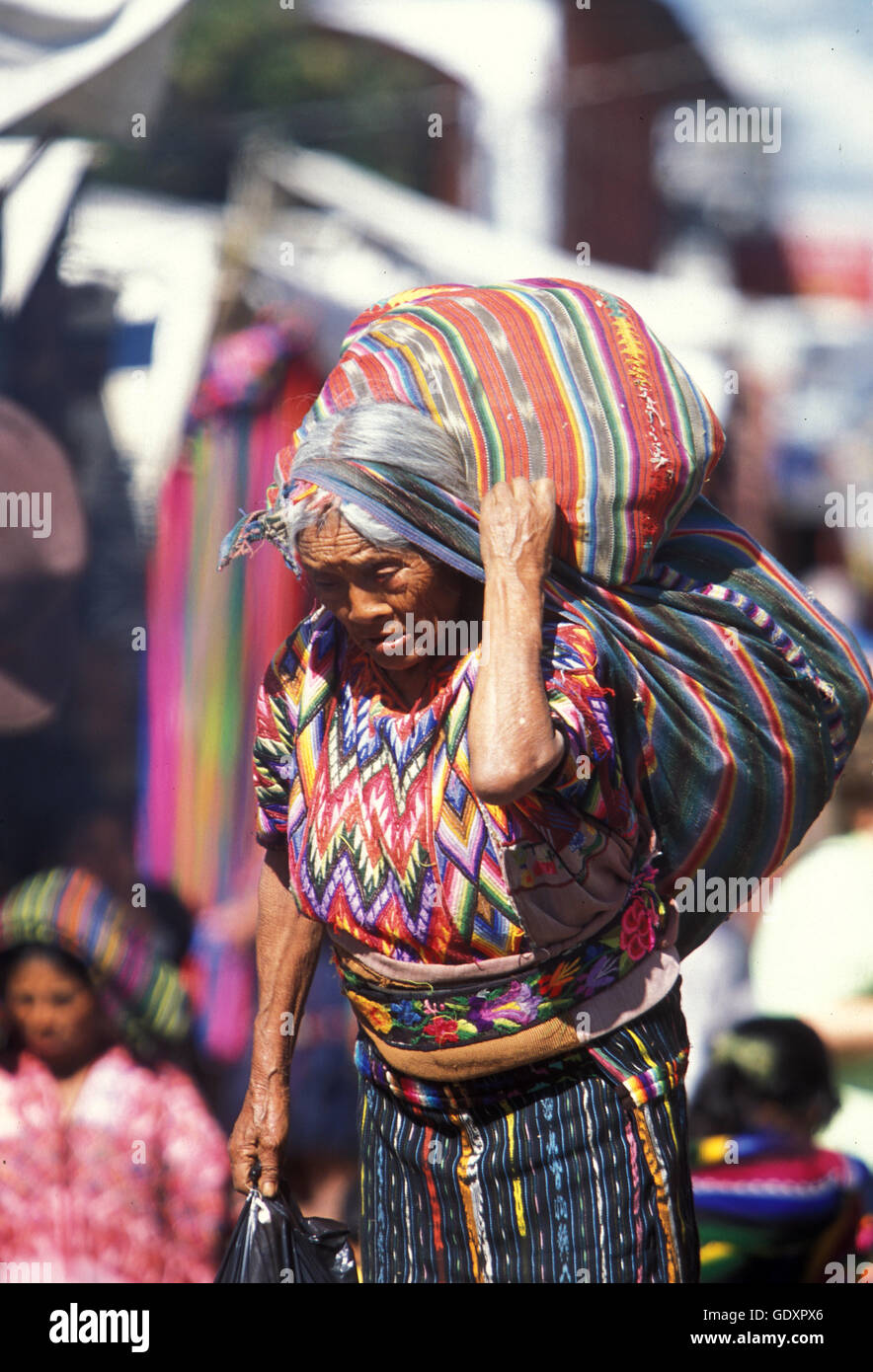people in traditional clotes at the Market in the Village of Chichi or ...