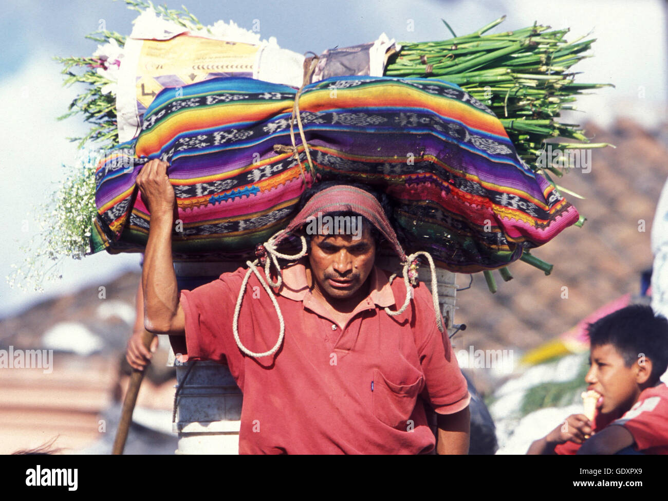 people in traditional clotes at the Market in the Village of Chichi or ...