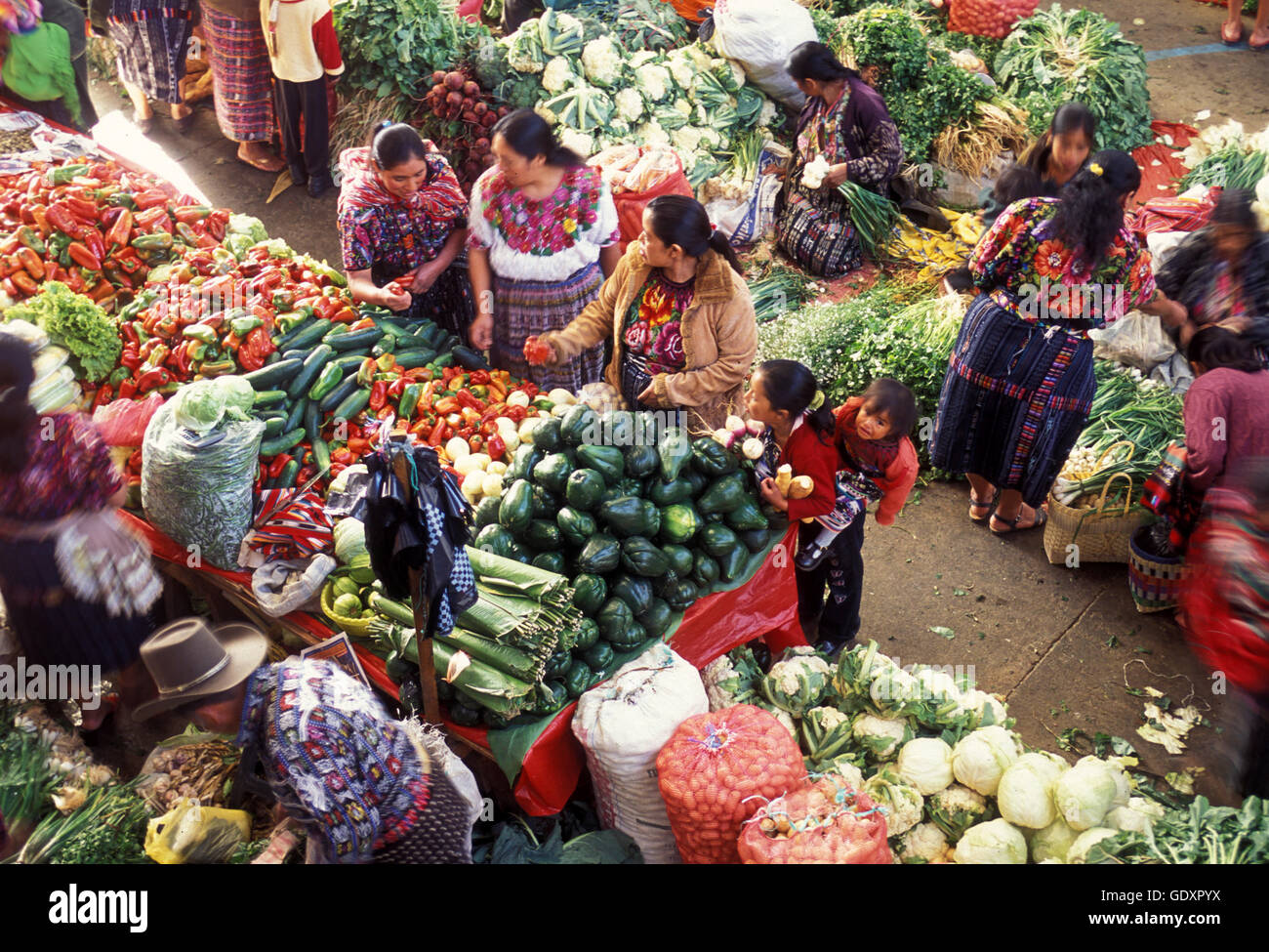 people in traditional clotes at the Market in the Village of Chichi or ...