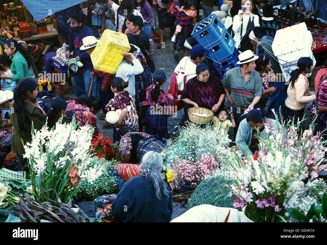 people in traditional clotes at the Market in the Village of Chichi or ...