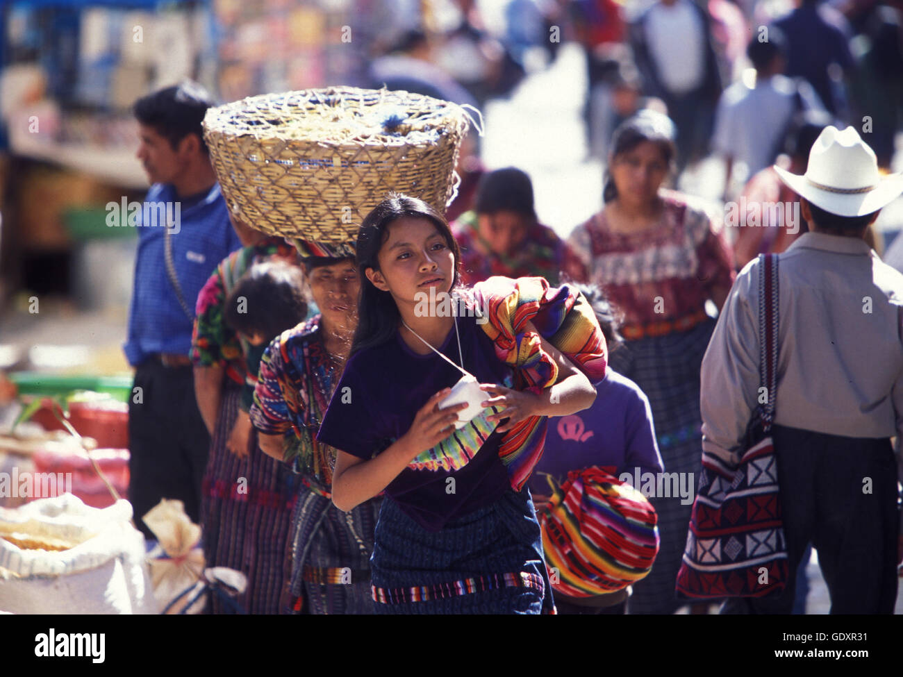 people in traditional clotes at the Market in the Village of Chichi or ...