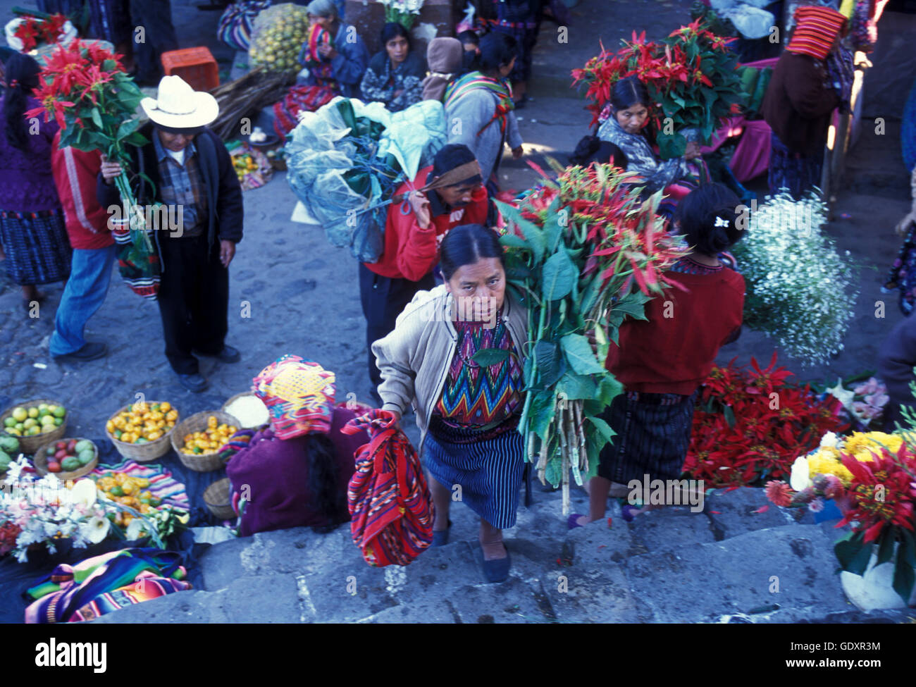 people in traditional clotes at the Market in the Village of Chichi or ...