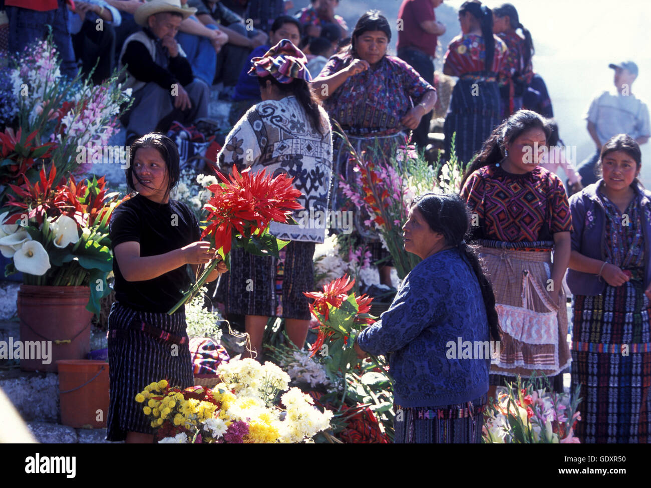 people in traditional clotes at the Market in the Village of Chichi or ...