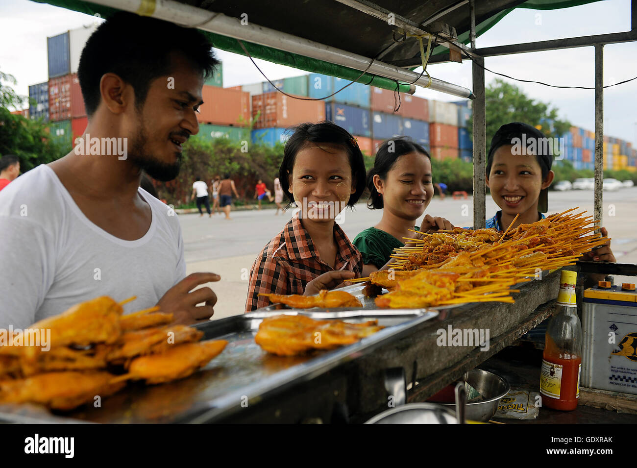 2014 a streetfood vendor in the former burmese capital hi-res stock ...