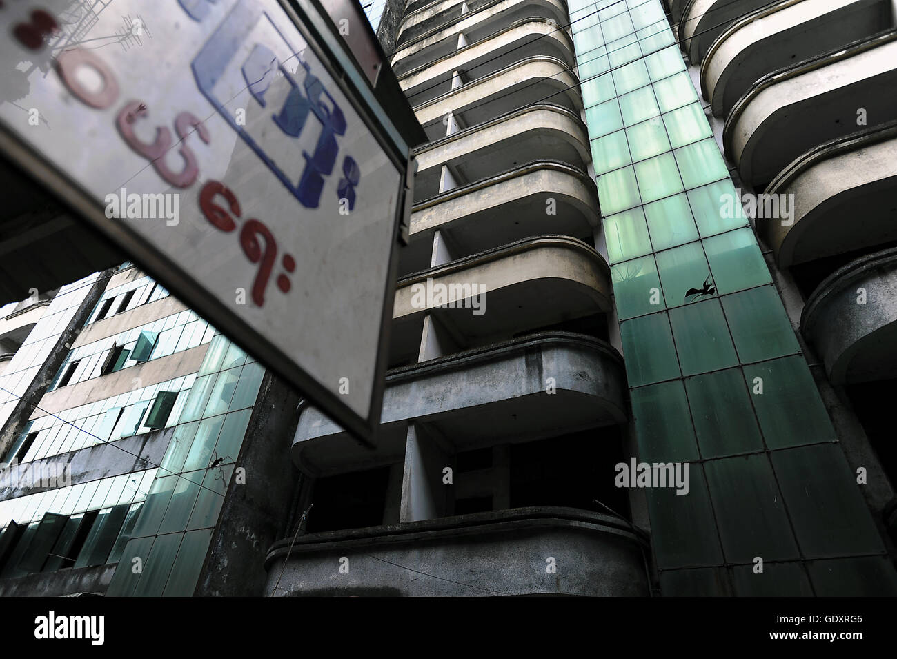MYANMAR. Yangon. 2014. Abandoned high-rise building Stock Photo - Alamy