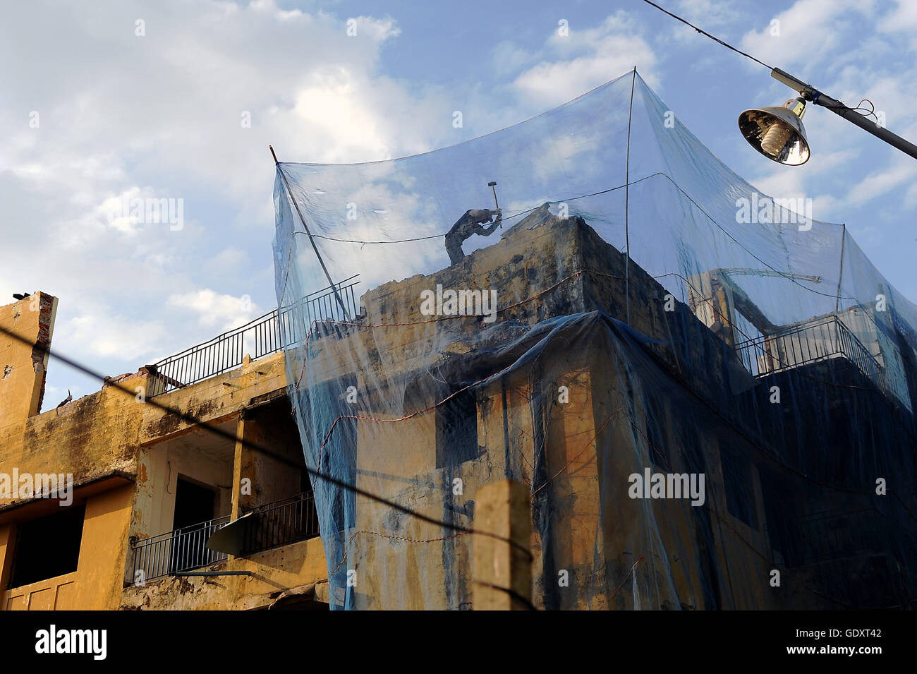 MYANMAR. Yangon. 2014. Demolition works Stock Photo - Alamy
