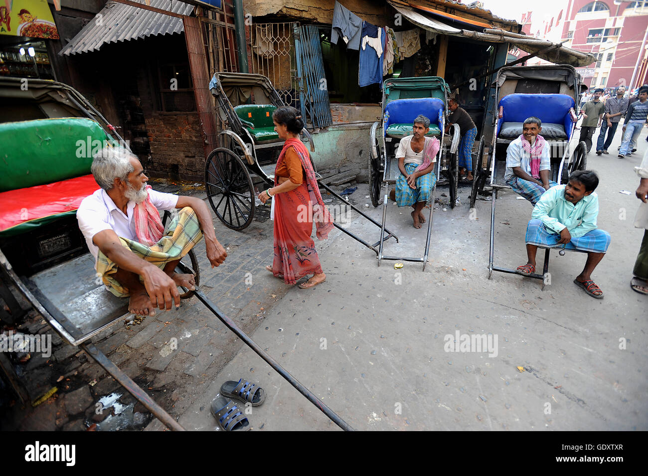 Rickshaws pullers hi-res stock photography and images - Alamy