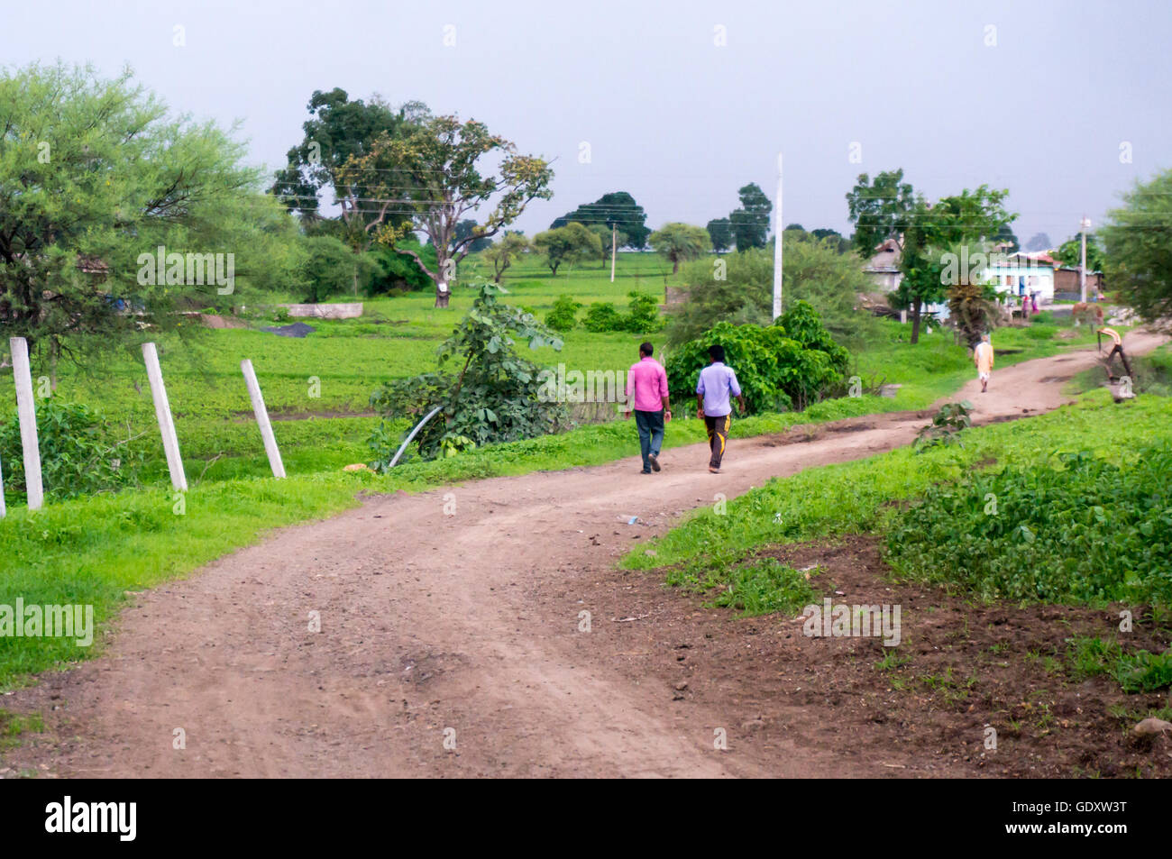 People walking on dirth path Stock Photo - Alamy