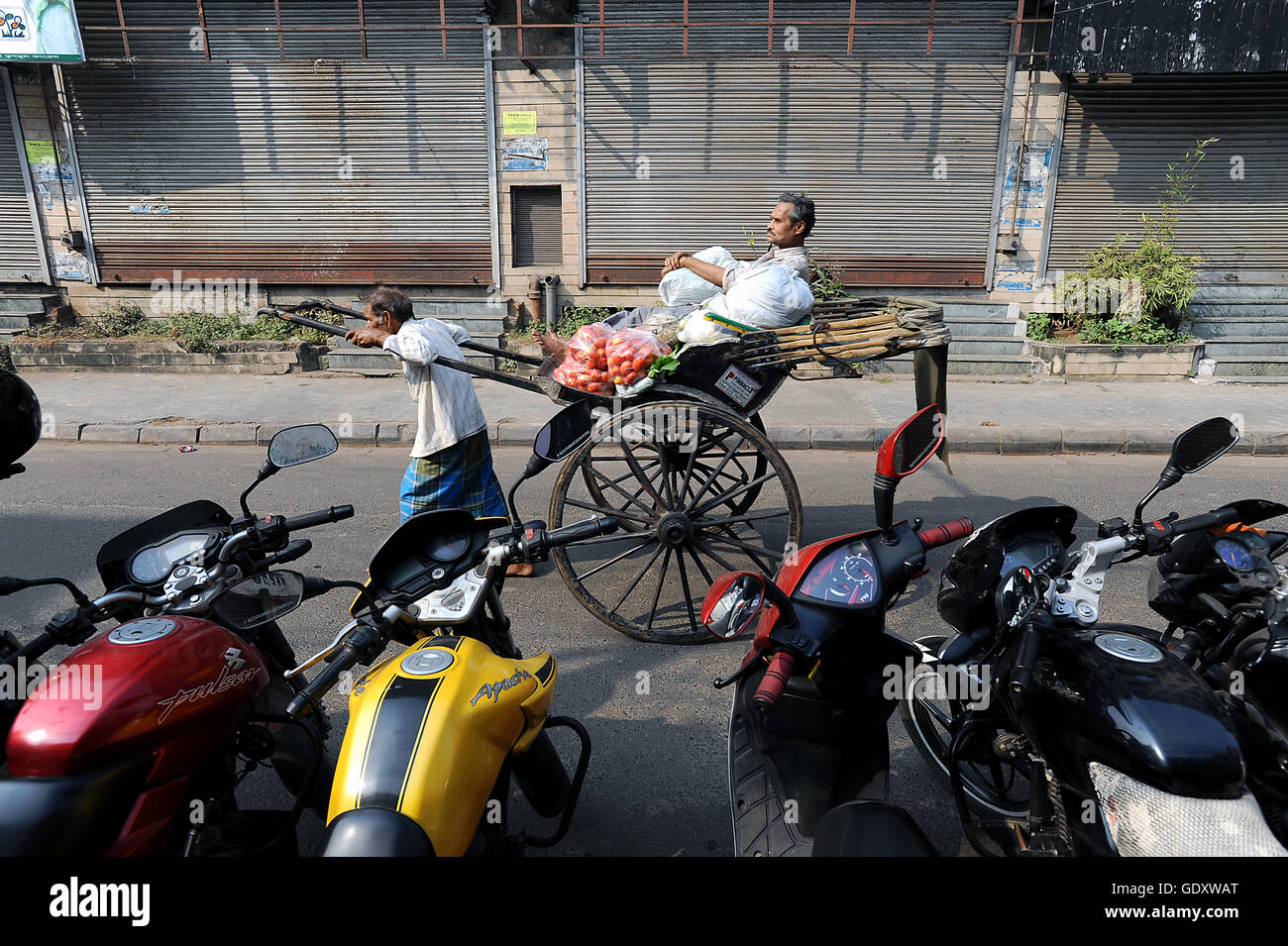 Hand pulls rickshaw hi-res stock photography and images - Alamy