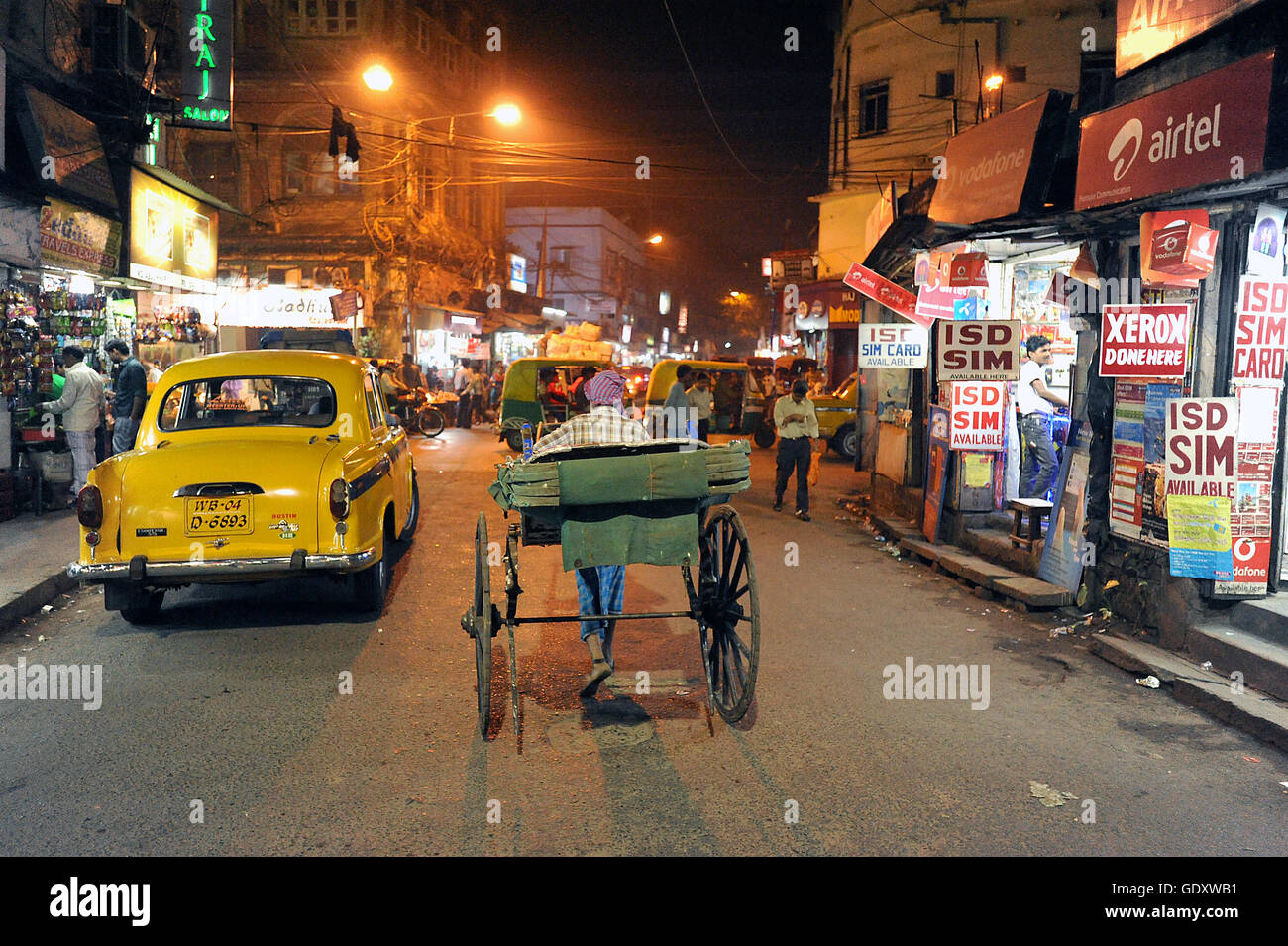 Hand pulled rickshaw calcutta street scene calcutta india hi-res stock ...