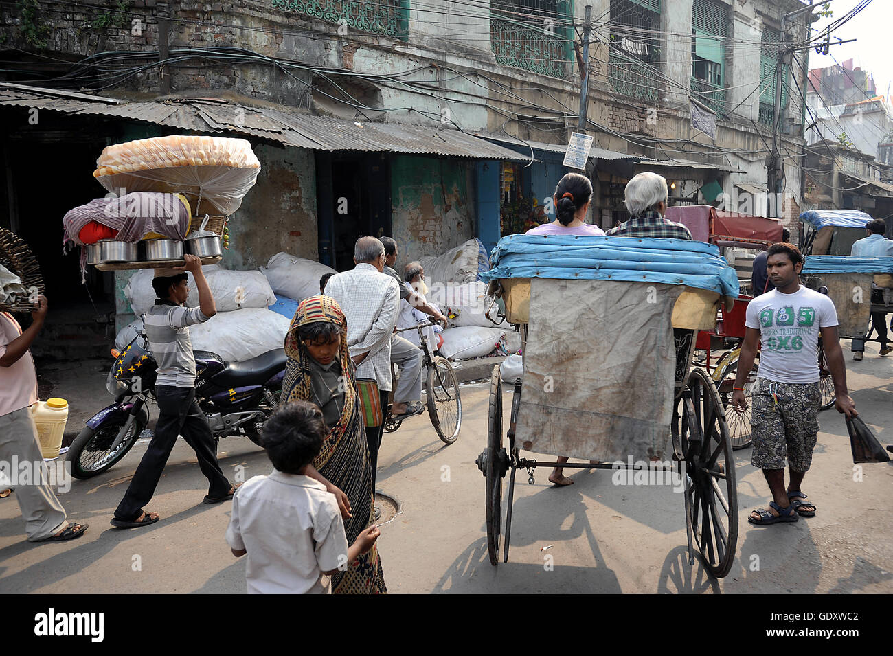 Hand pulled rickshaw calcutta street scene calcutta india hi-res stock ...