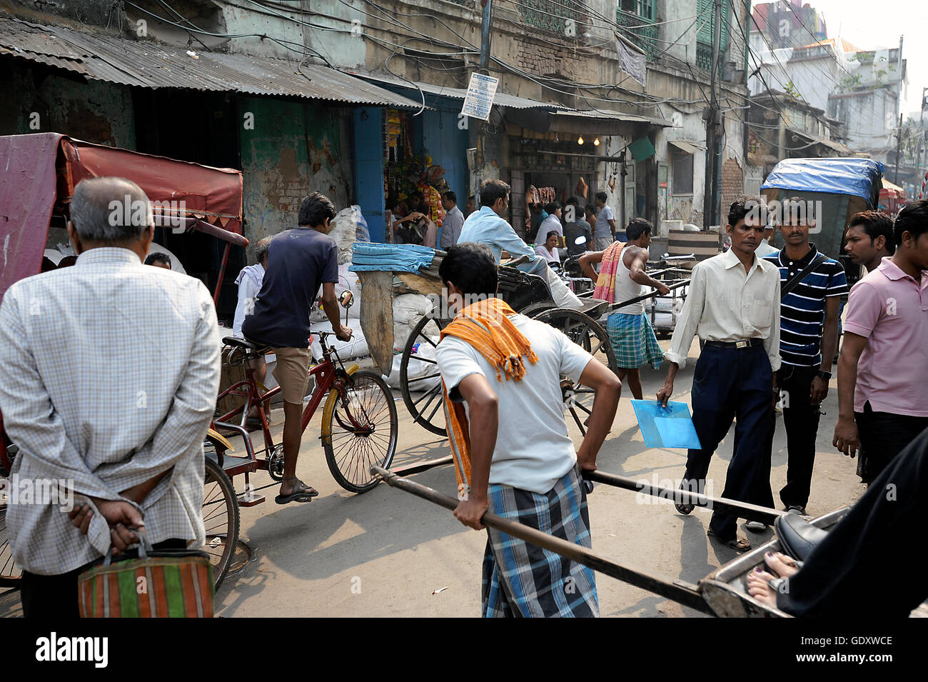Hand pulled rickshaw calcutta street scene calcutta india hi-res stock ...