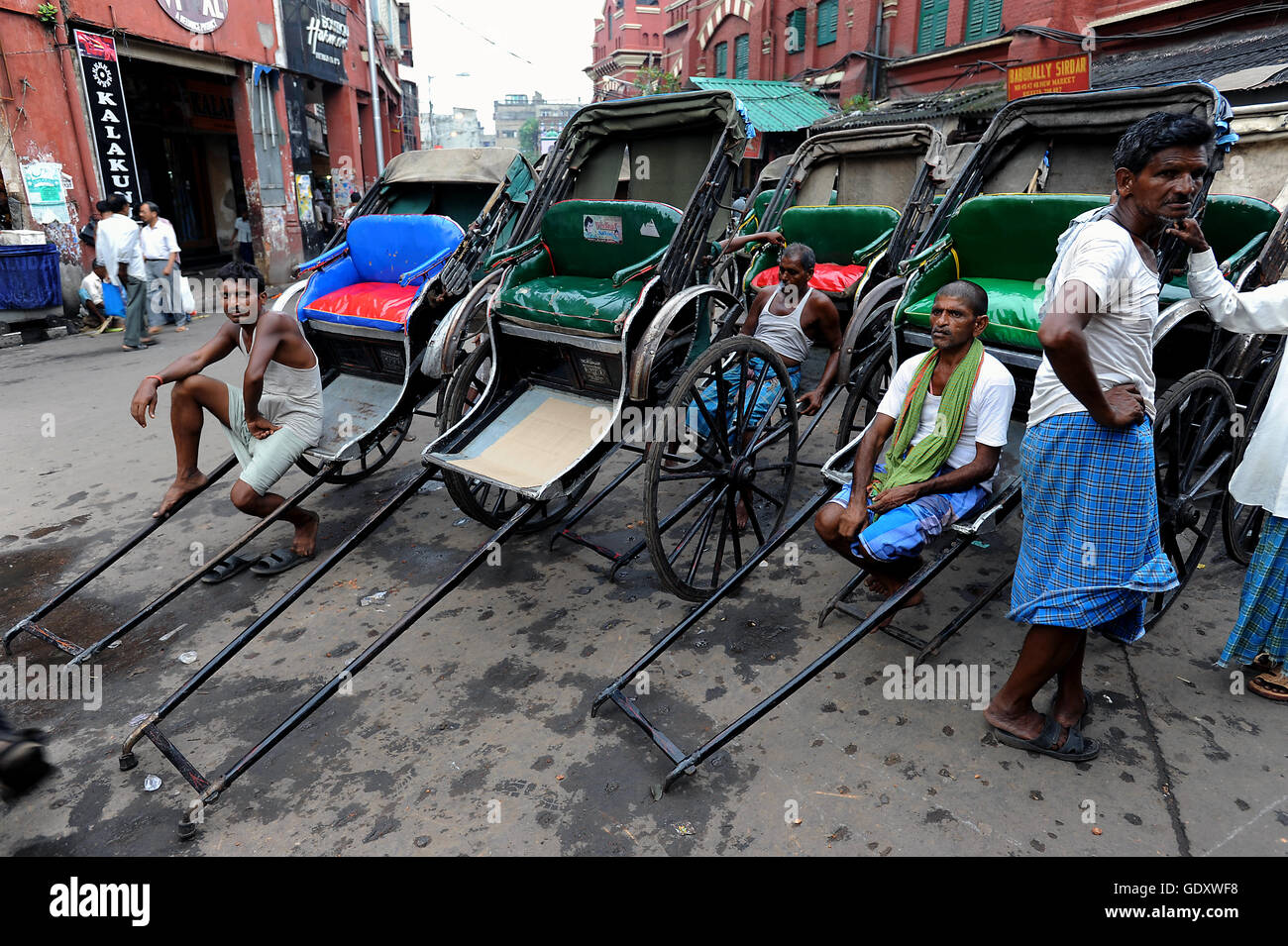 Hand pulled rickshaw pullers hi-res stock photography and images - Alamy
