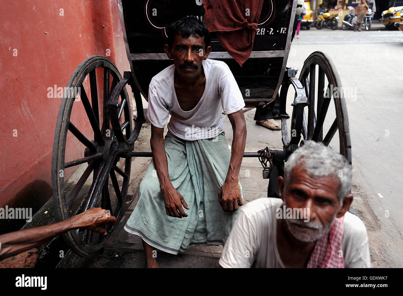 Hand pulled rickshaw pullers hi-res stock photography and images - Alamy