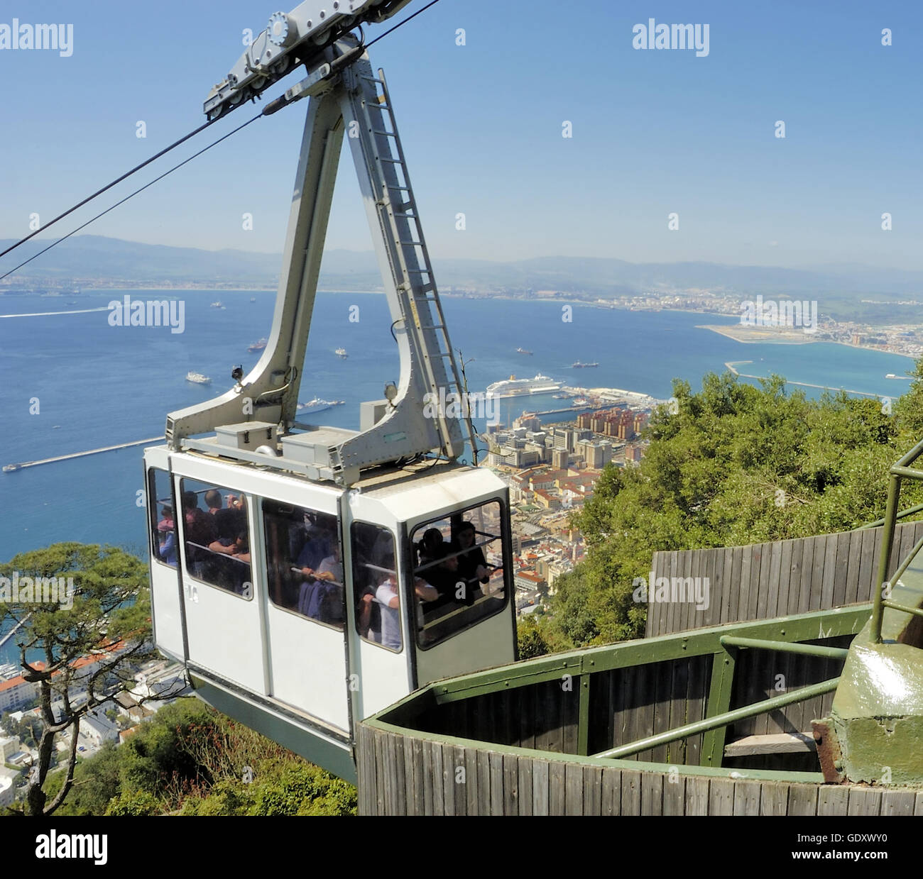 Looking down at the upcoming cable car on the rock of Gibraltar with ...