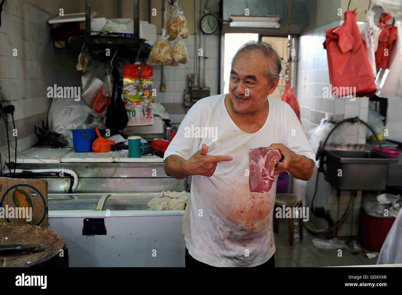 SINGAPORE. 2015. Pork butcher Stock Photo - Alamy