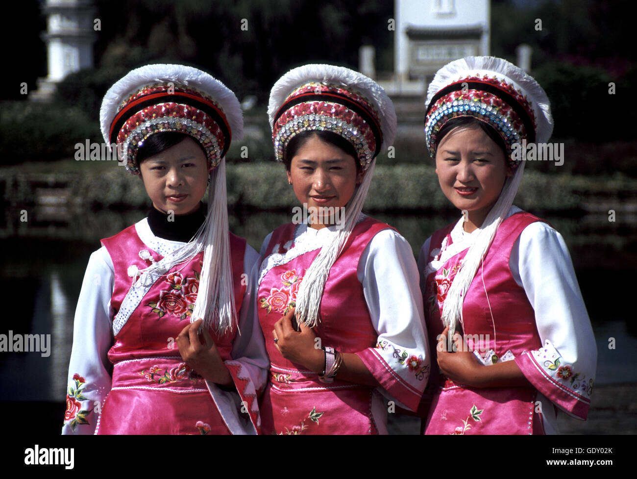 Portrait of three Sani girls at the Yunnan Nationalities Village near ...