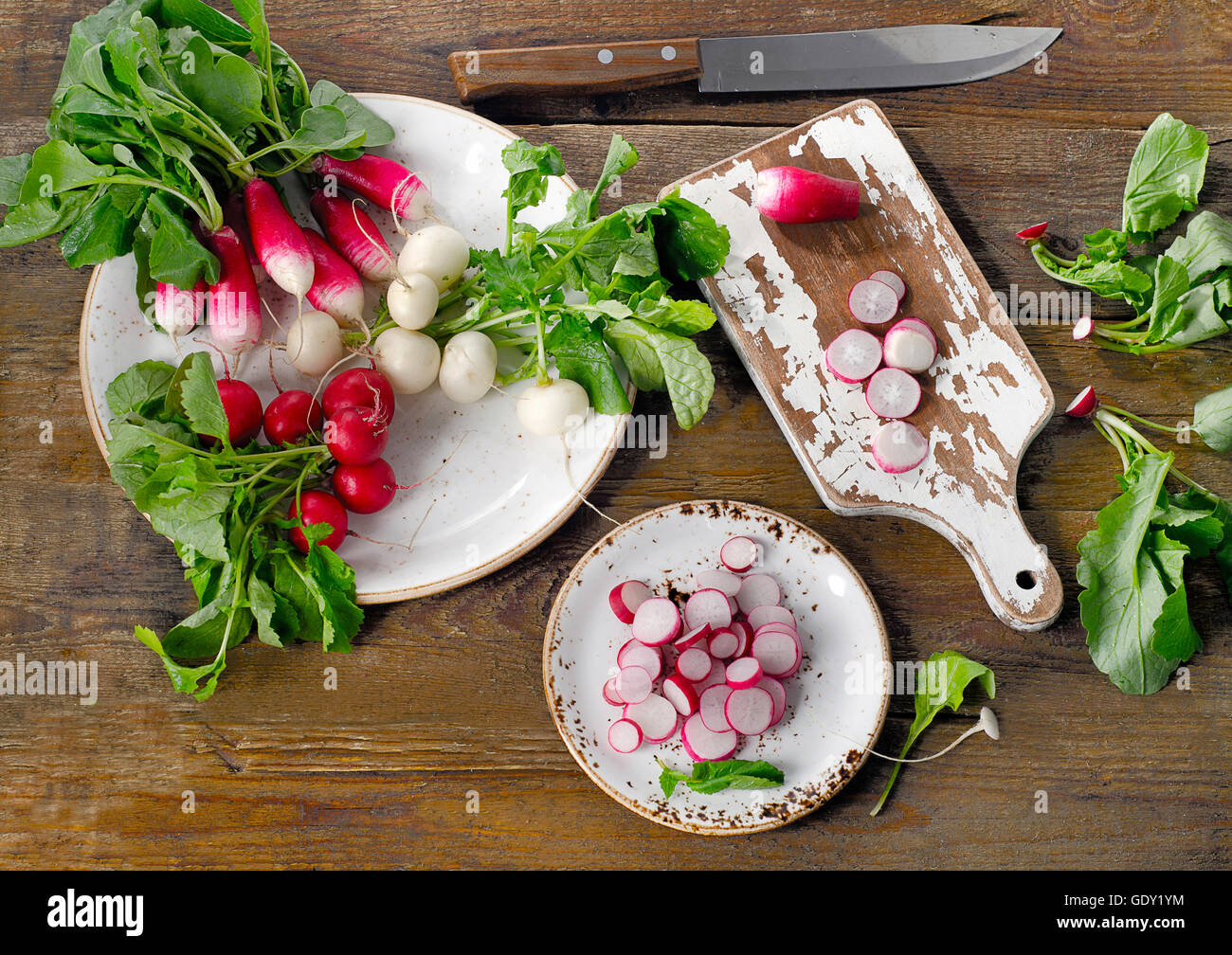 Fresh organic radishes on table. Top view Stock Photo - Alamy