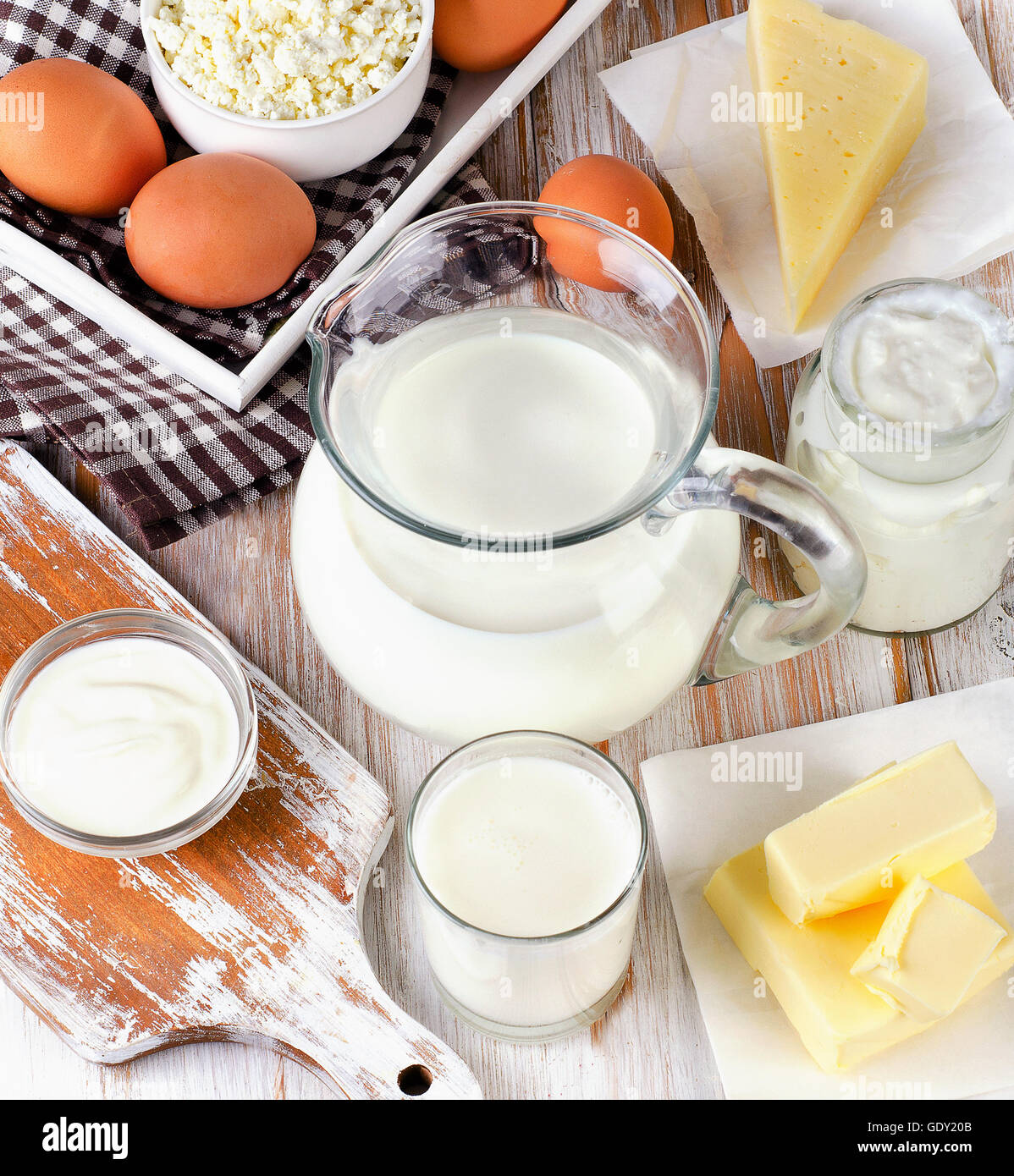 Dairy products on wooden table. Top view Stock Photo - Alamy