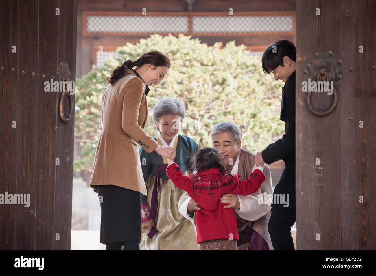 Family visiting their relatives Stock Photo - Alamy