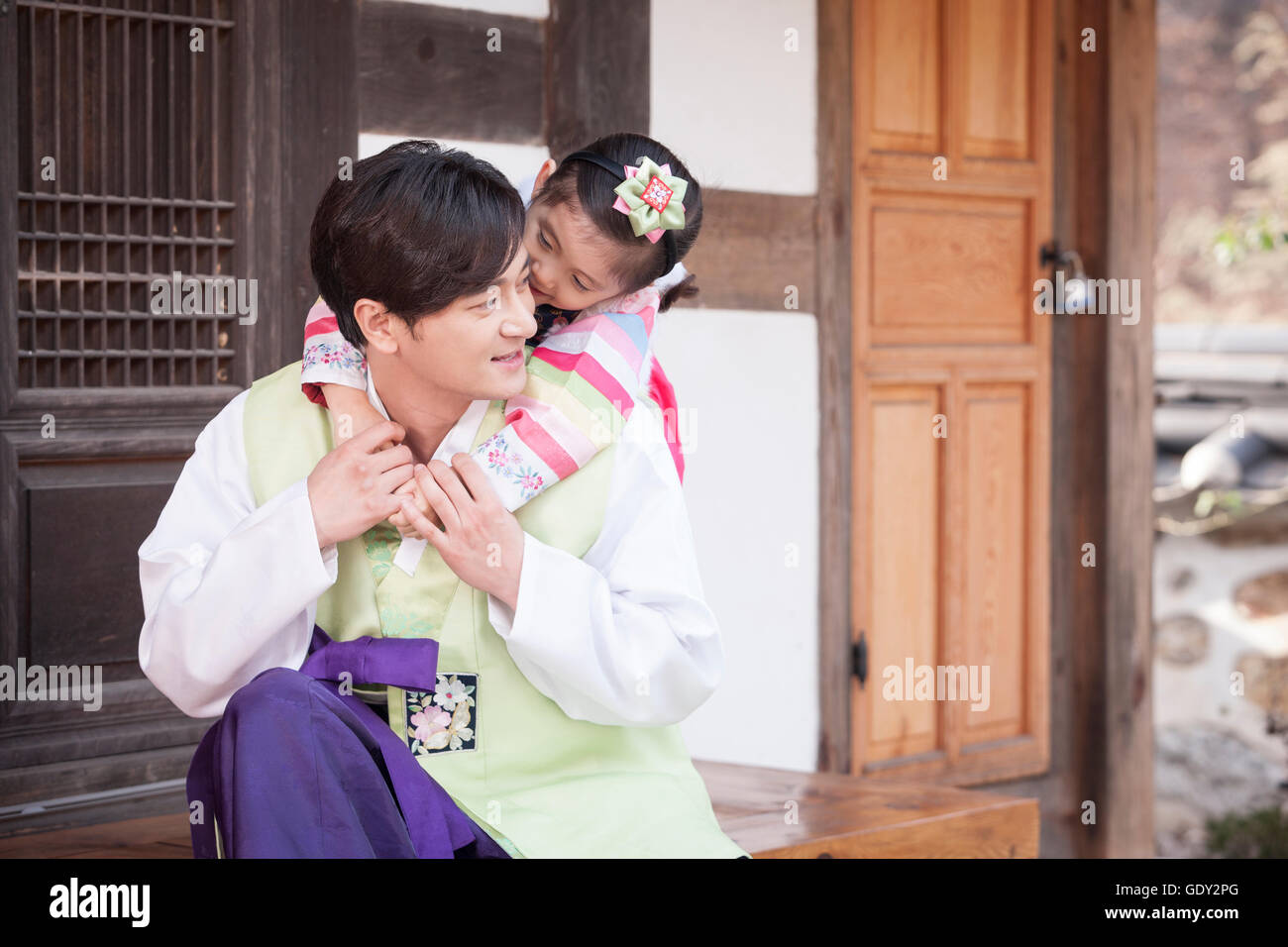 Loving father and daughter in traditional Korean clothes Stock Photo ...