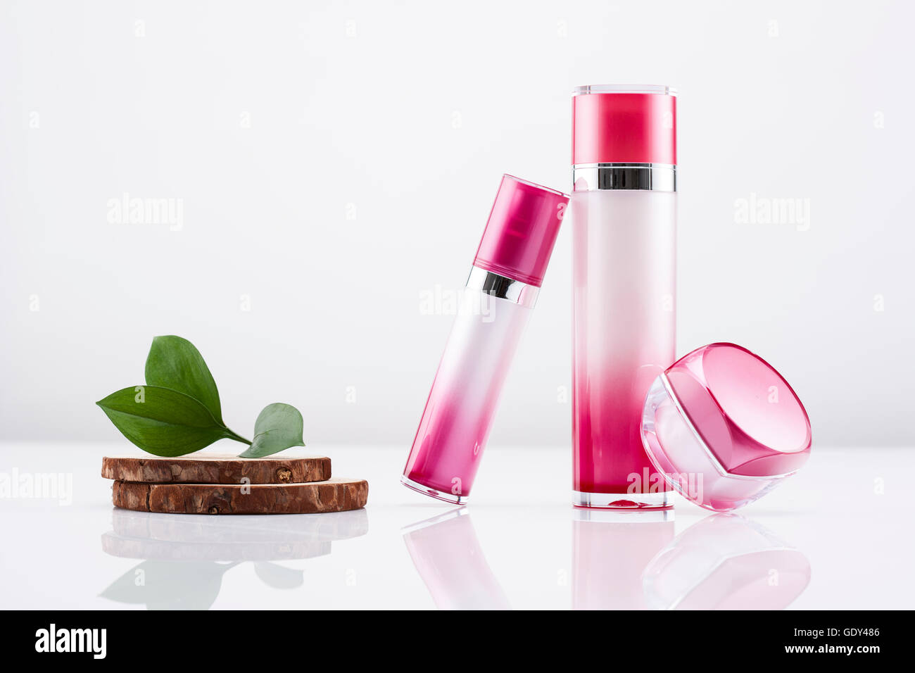Set of cosmetics with plant Stock Photo - Alamy