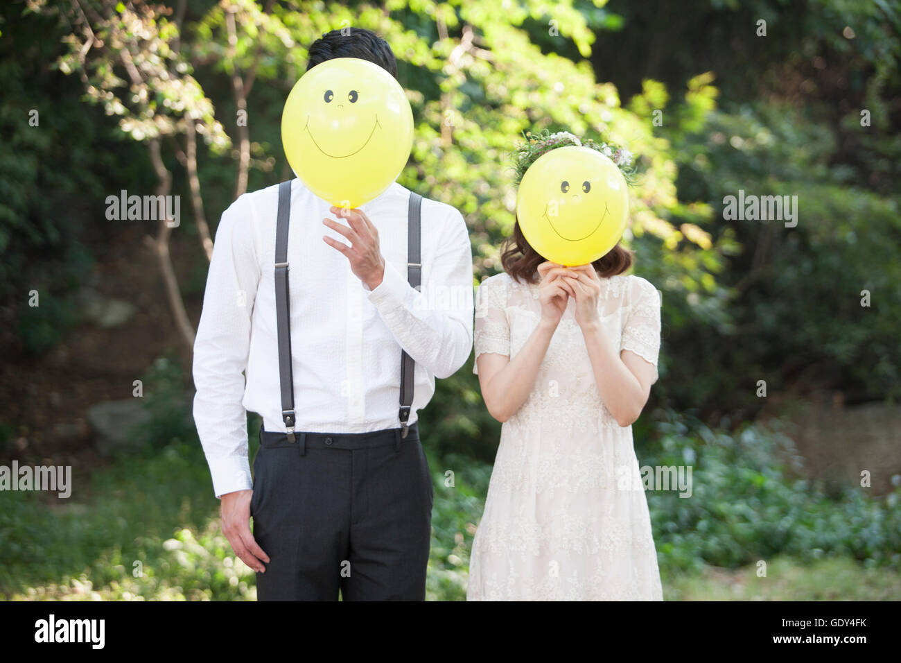 Covering faces hi-res stock photography and images - Alamy