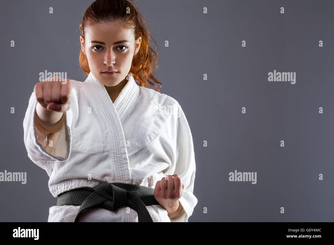 Woman throwing punch hi-res stock photography and images - Alamy
