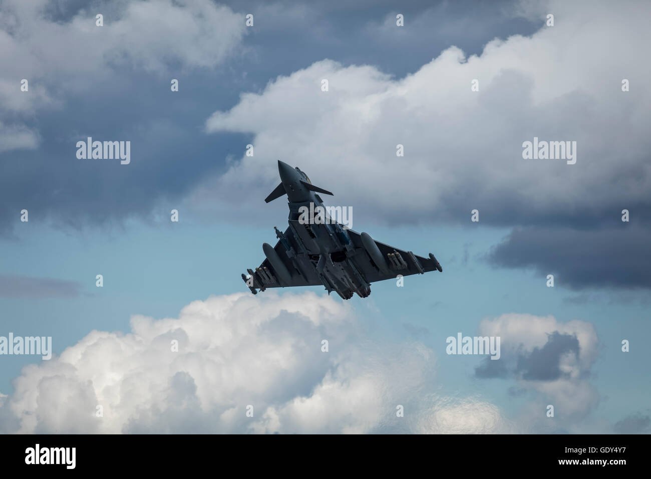 RAF Typhoon military jet plane in flight in the sky at Farnborough ...