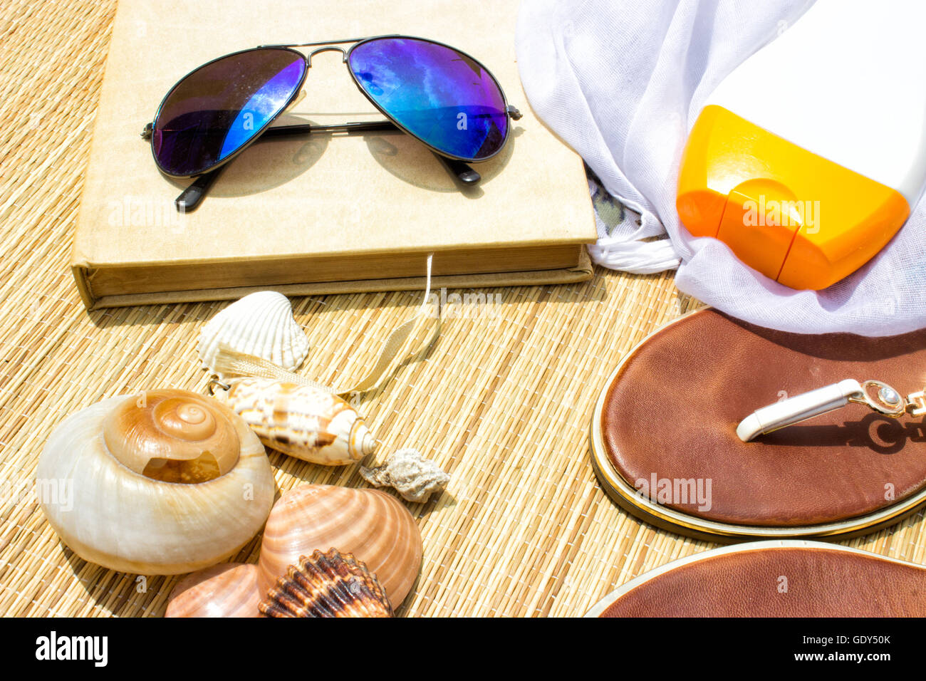 Book on the beach glasses hi-res stock photography and images - Alamy