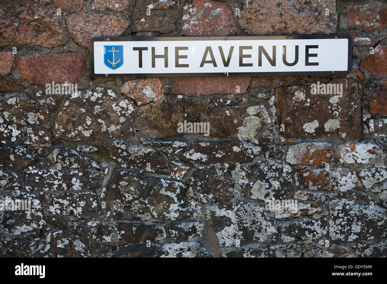 Color image of a street name placard on a wall Stock Photo - Alamy