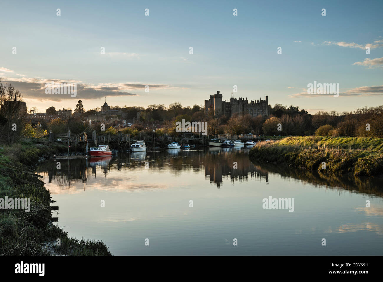 Landscape image of medieval Castle viewed across River at sunset Stock ...