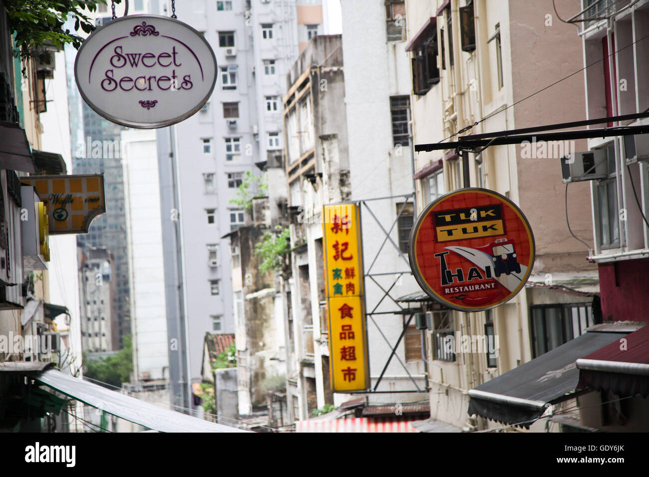 Shop's signs over Hong Kong street, Chain, Asia Stock Photo - Alamy