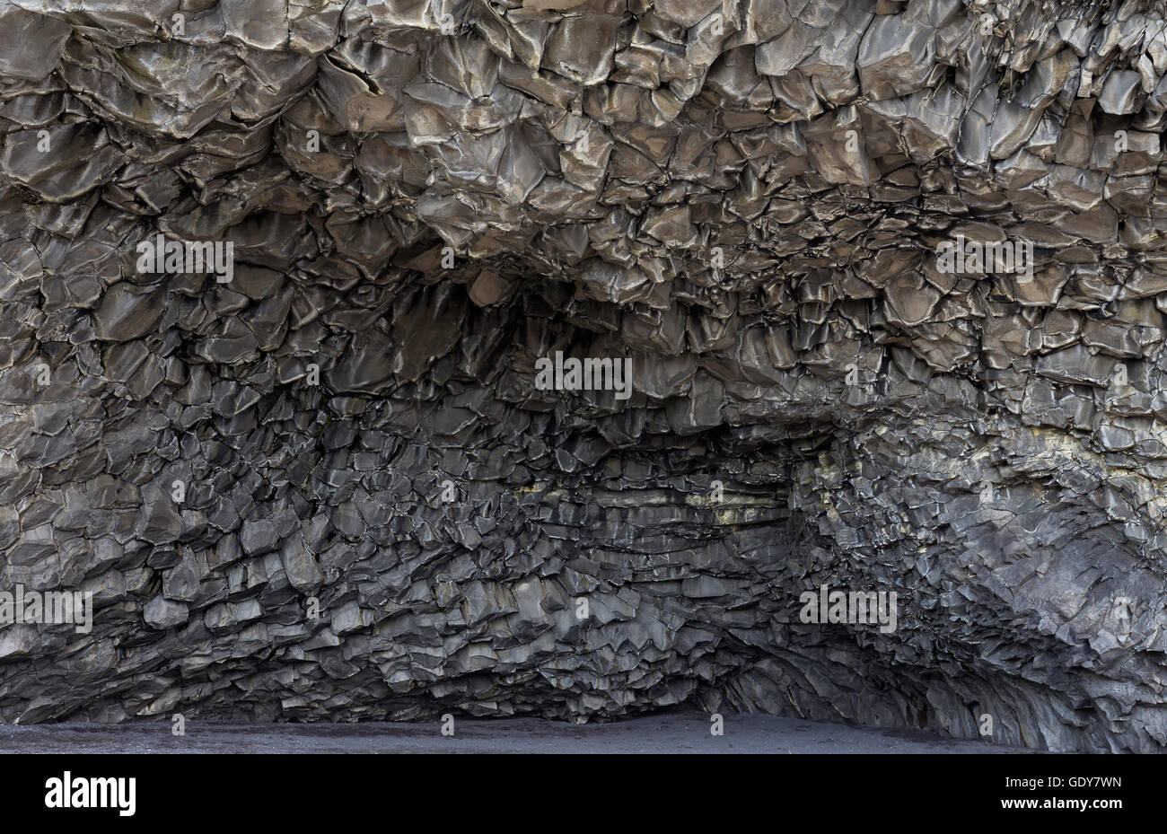 Basalt column formations on the black beach in Icealnd, salt deposits ...
