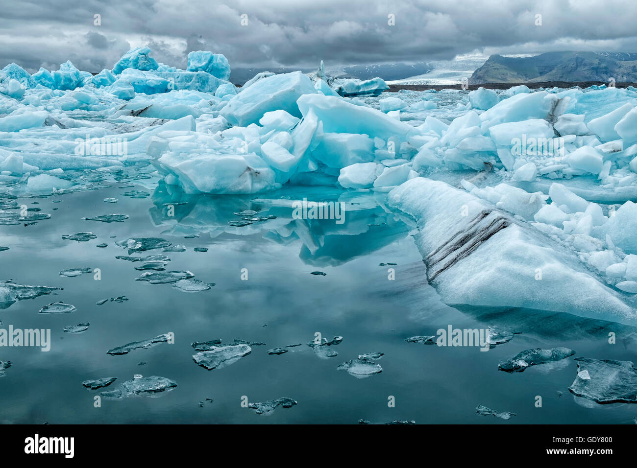 Blue icebergs floating the Jokulsarlon glacial lagoon in southeast ...