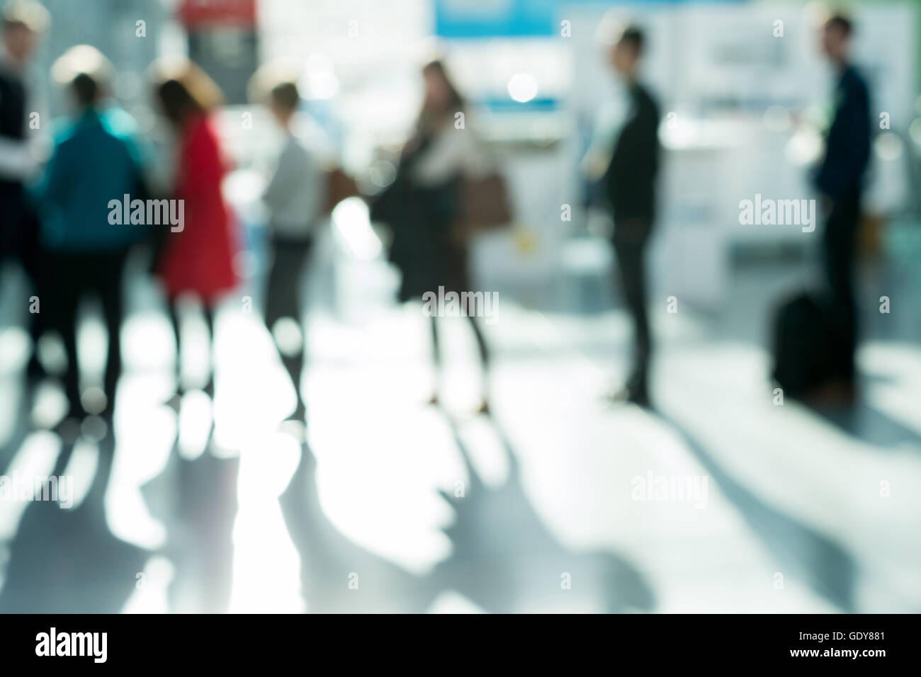 Out of focus shot of people lined up at a generic checkout Stock Photo ...