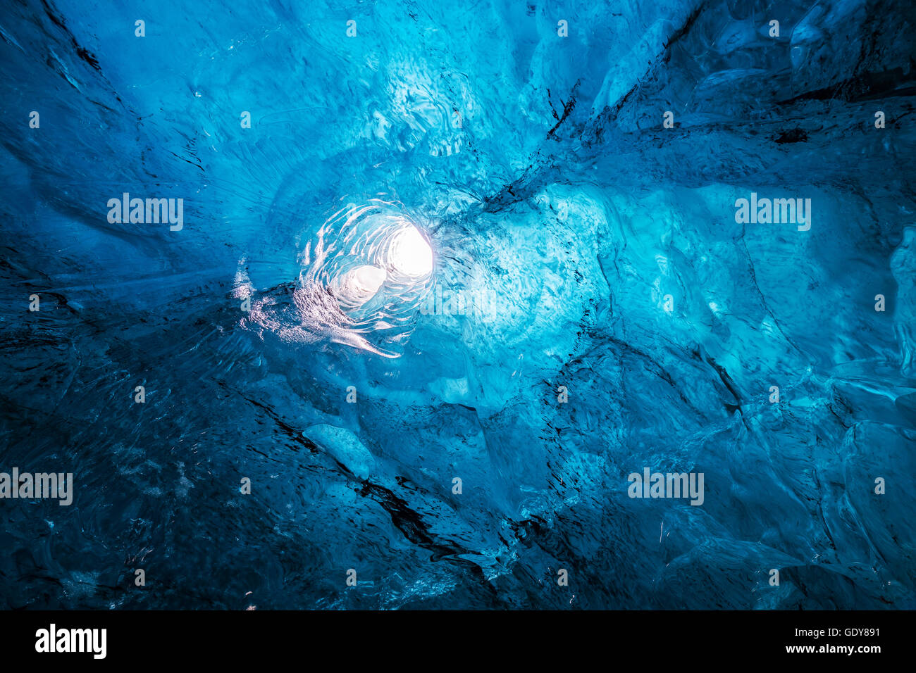 Ancient clear blue ice in an ice cave in iceland Stock Photo - Alamy