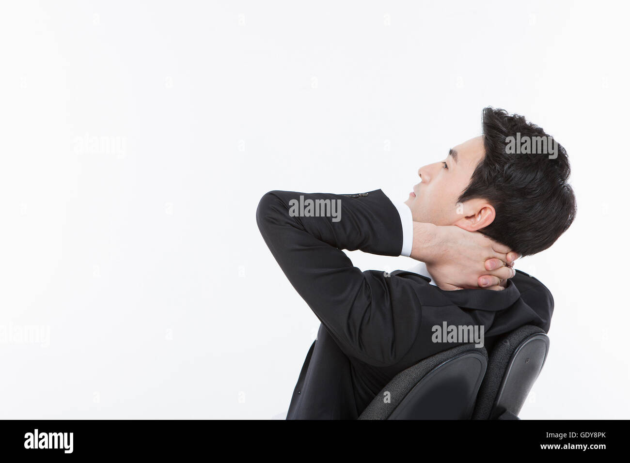 Side view portrait of business man resting on chair Stock Photo - Alamy